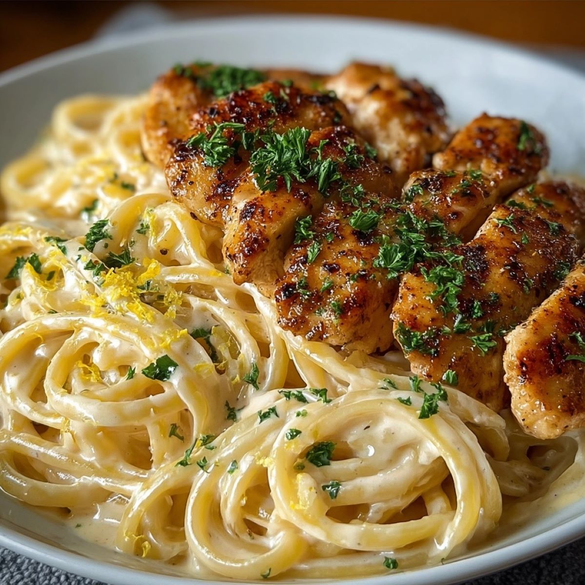 Lemon Garlic Butter Chicken with Creamy Parmesan Linguine - Travelers ...